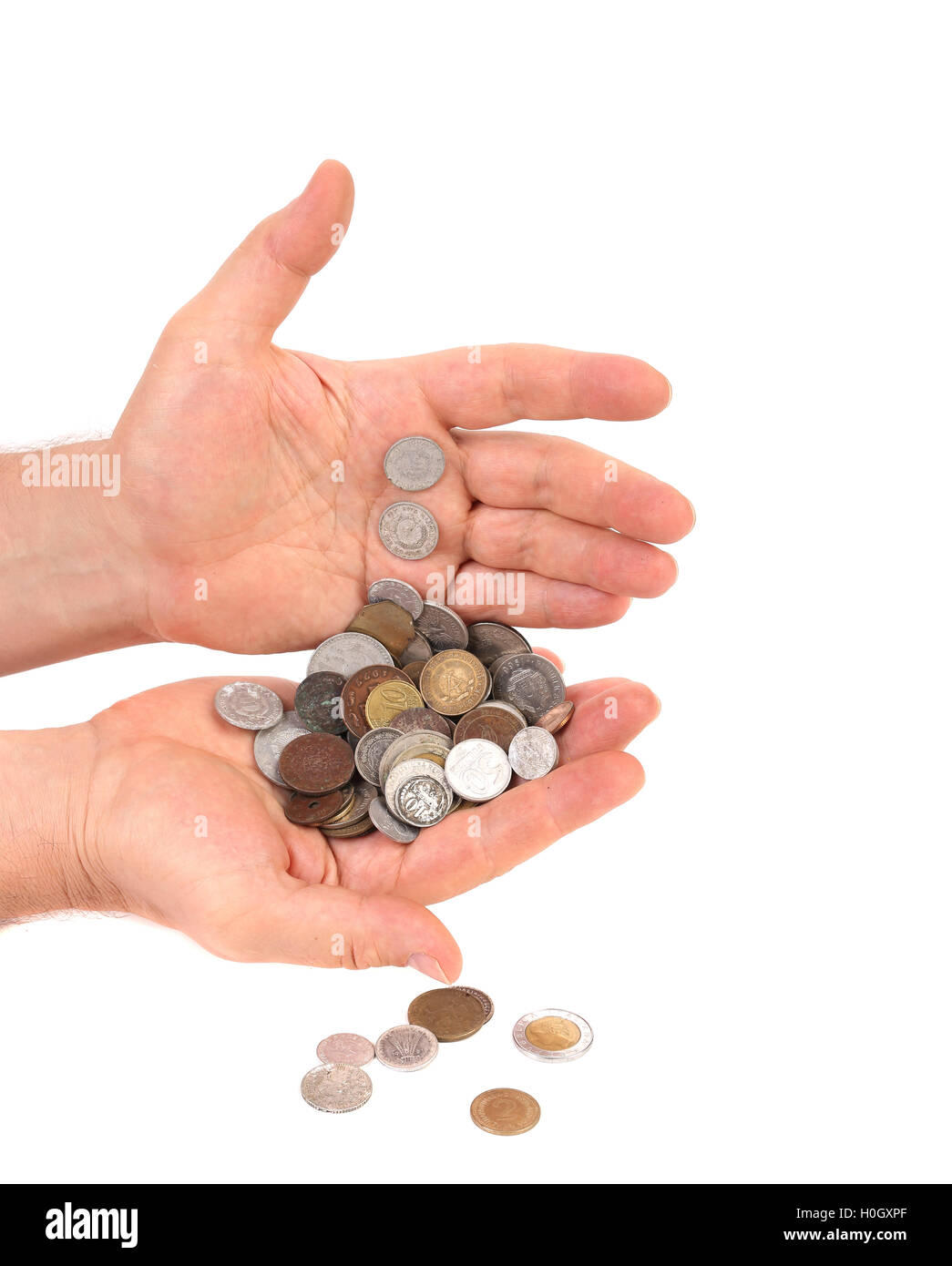 Coins in man hands Stock Photo - Alamy