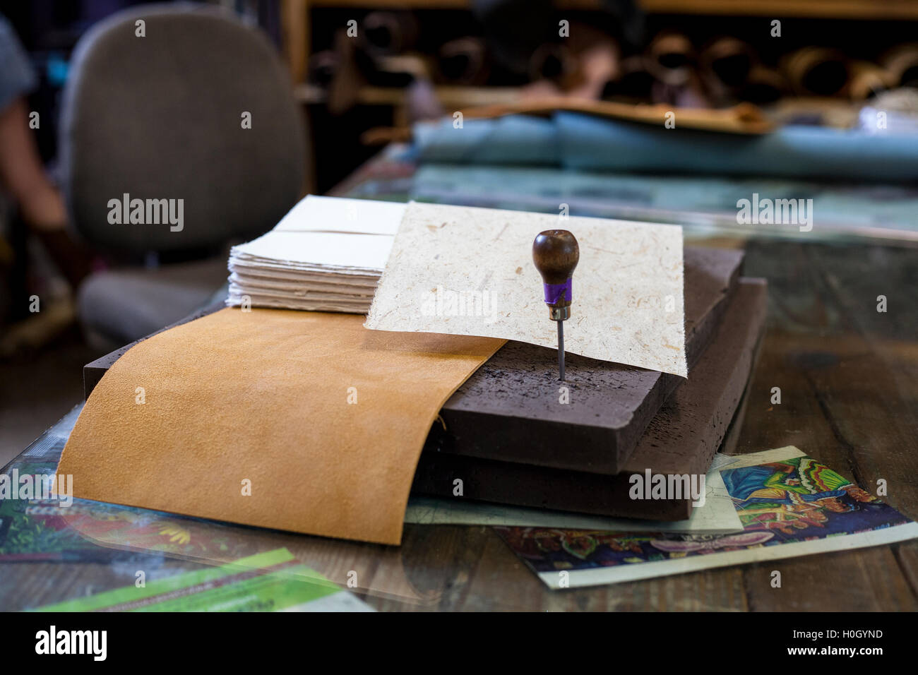 Bookbinder sets lays out tools for stitching Stock Photo - Alamy