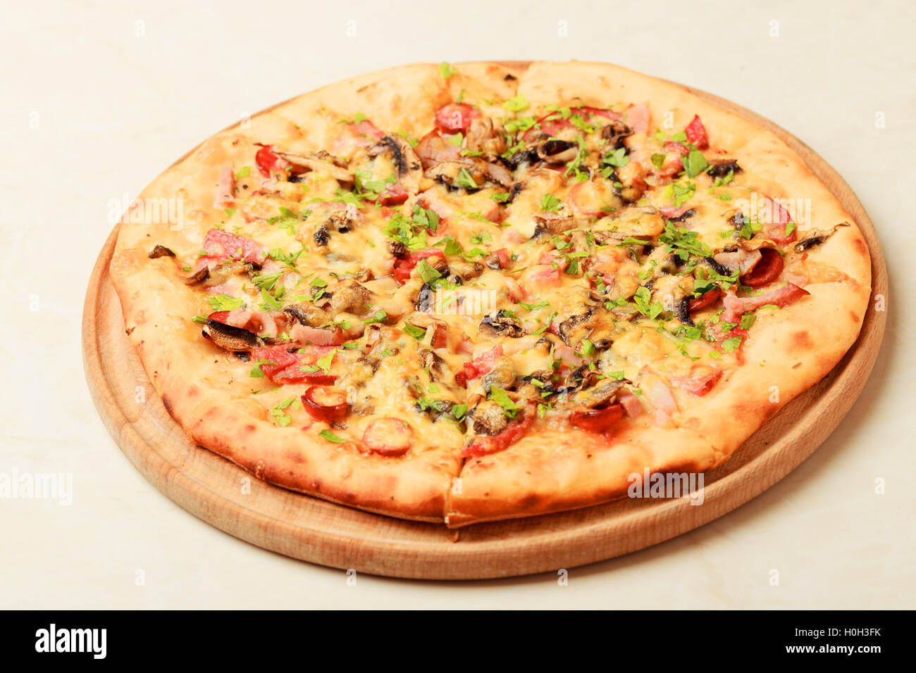 Tasty pizza isolated on white Stock Photo - Alamy