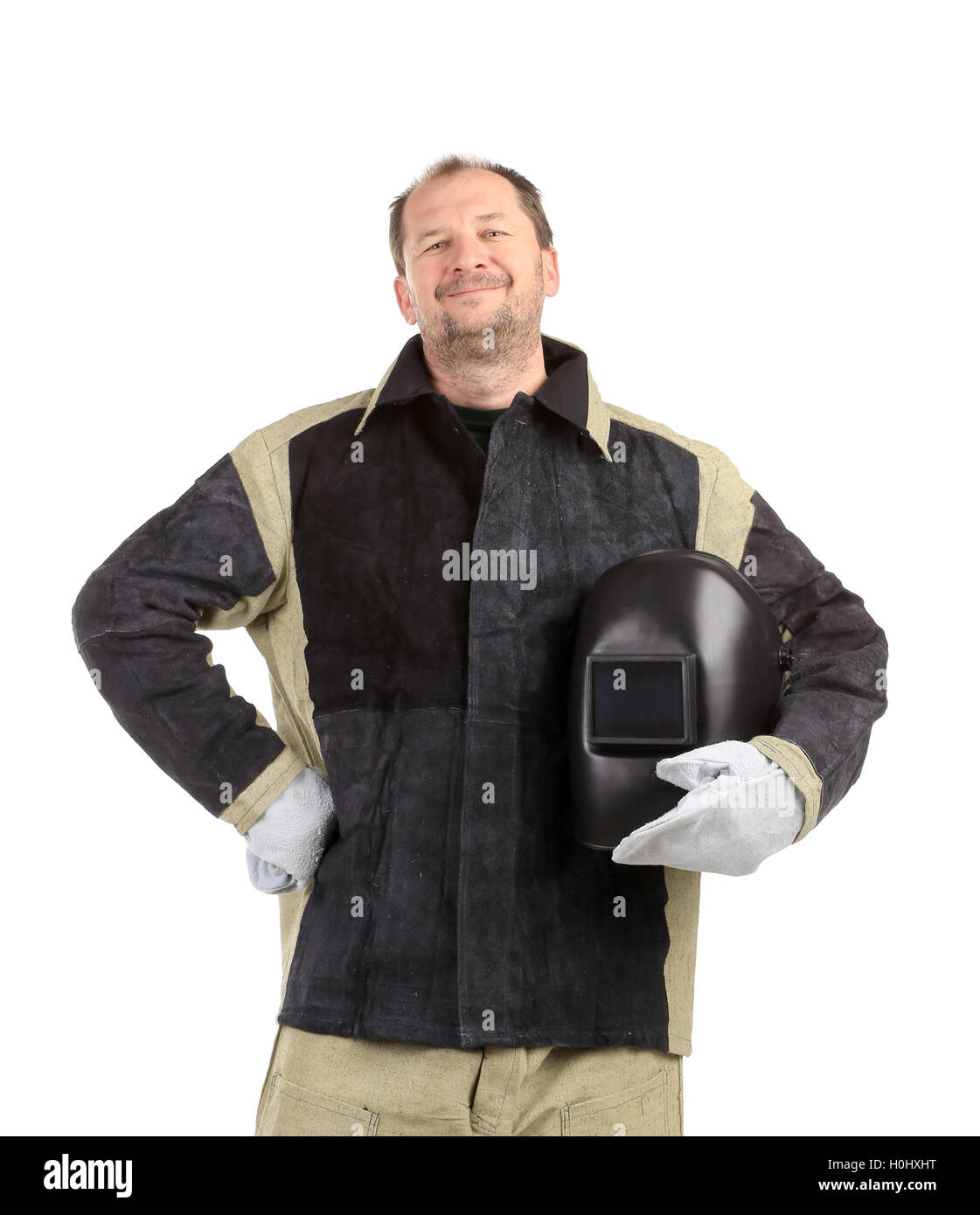 Welder with mask in hand Stock Photo - Alamy