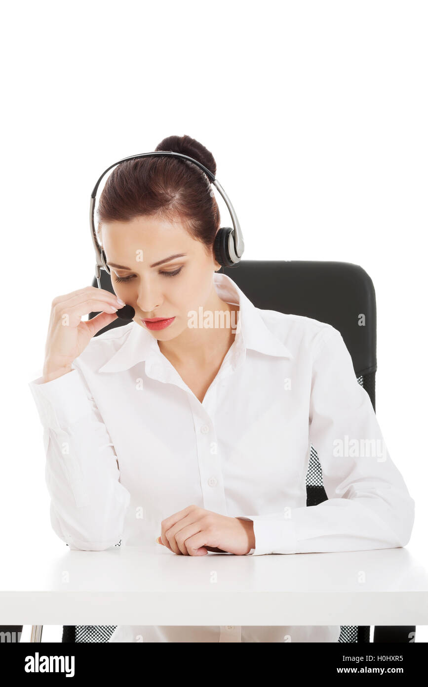 Beautiful woman sitting with microphone and headphones Stock Photo - Alamy