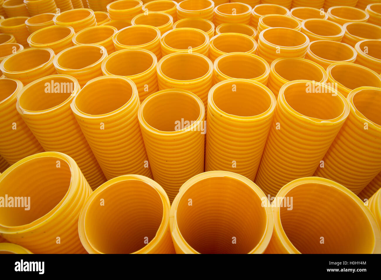 Yellow pvc plastic pipes hi-res stock photography and images - Alamy