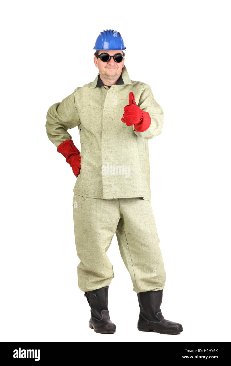 Welder in hard hat with thumbs up Stock Photo - Alamy