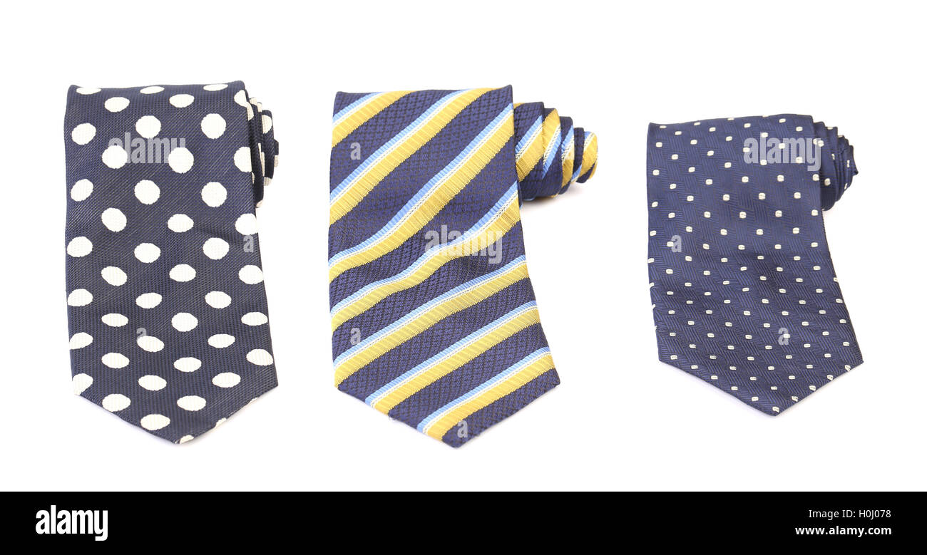 Three rolled multi-colored tie Stock Photo - Alamy