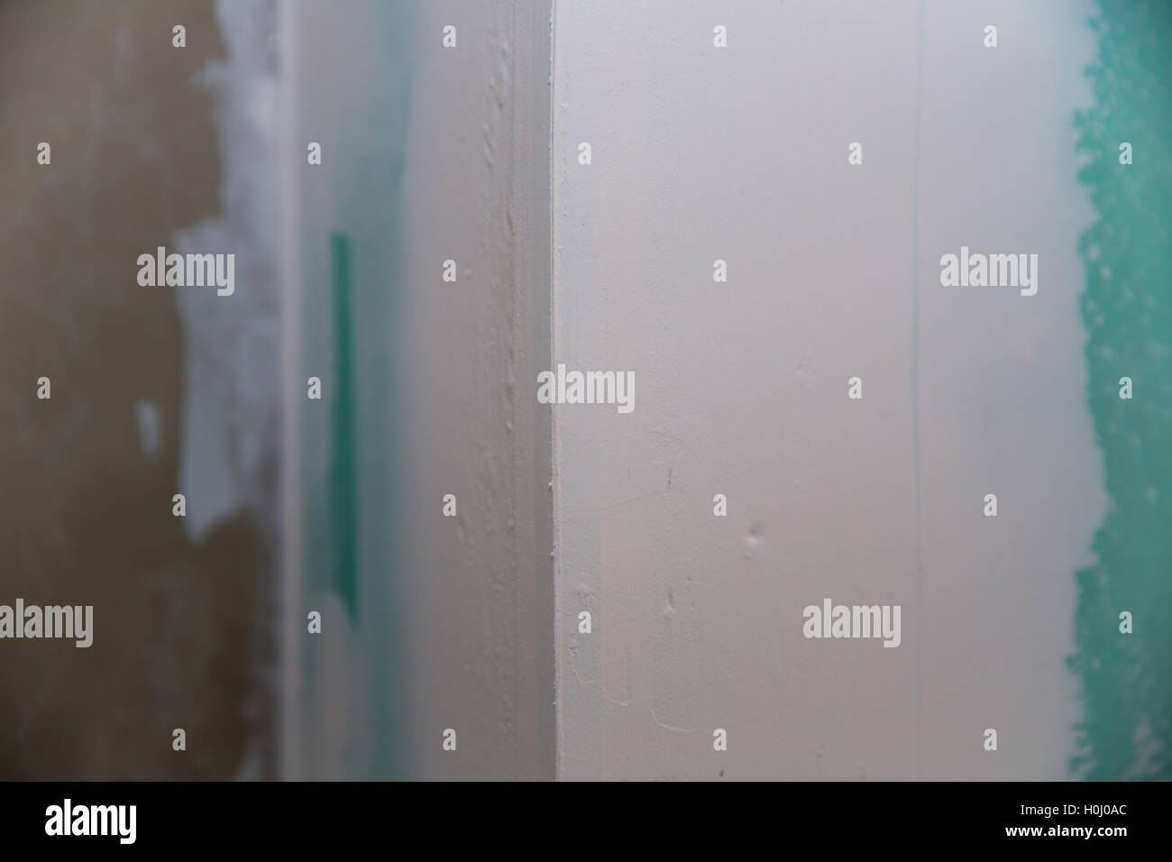 drywall hydrophobic plasterboard in green plaster seam Stock Photo - Alamy