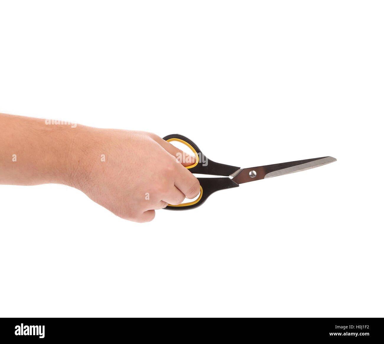 Male hand holding scissors Stock Photo - Alamy