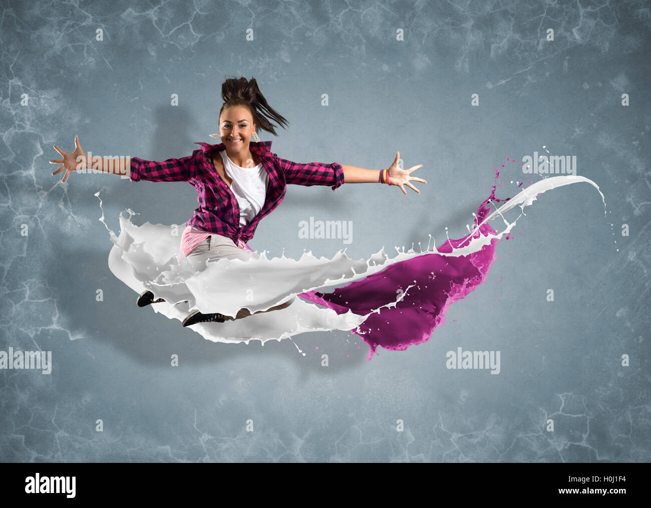 female dancer with splashes of paint Stock Photo - Alamy