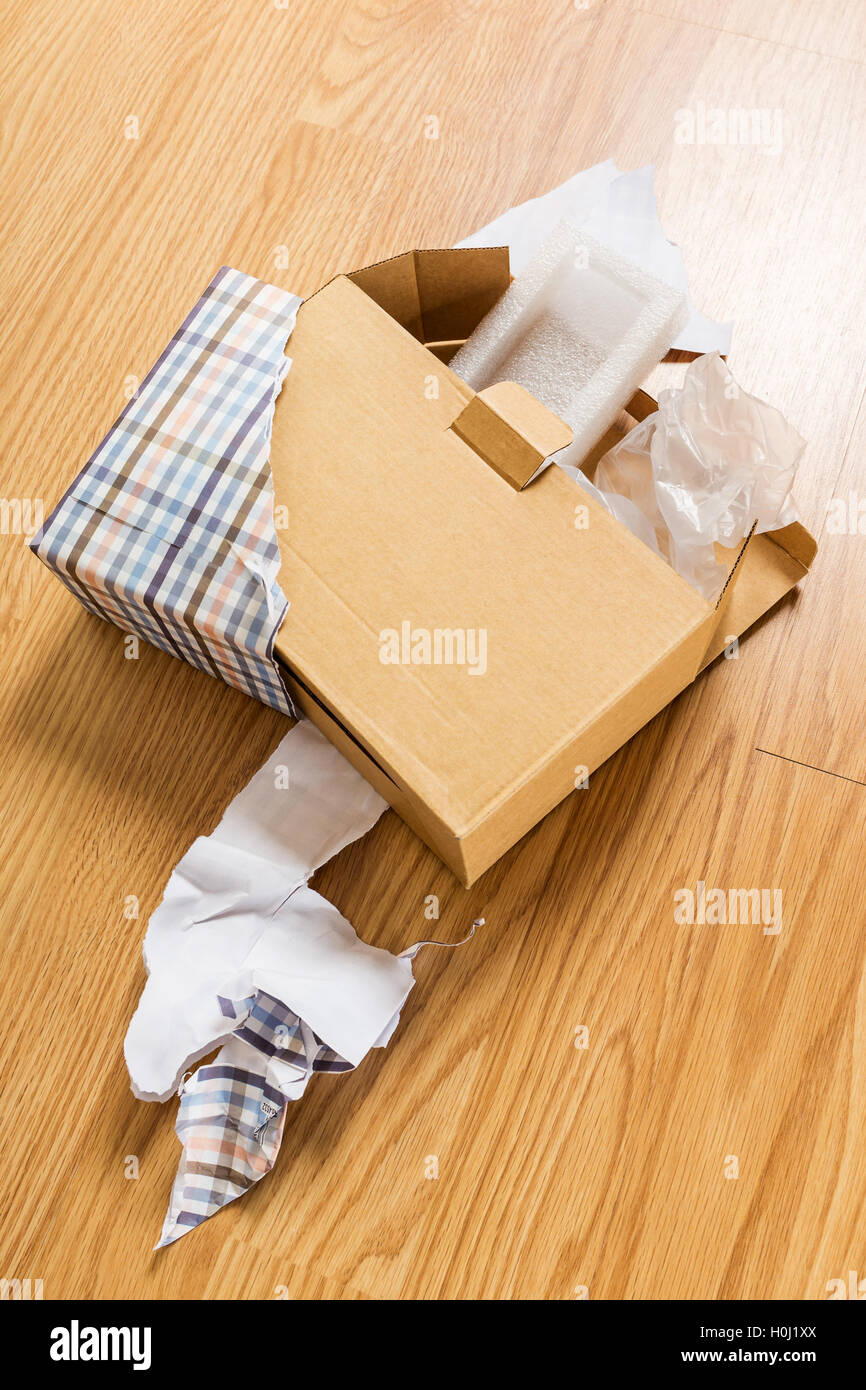 Unwrap parcel hi-res stock photography and images - Alamy