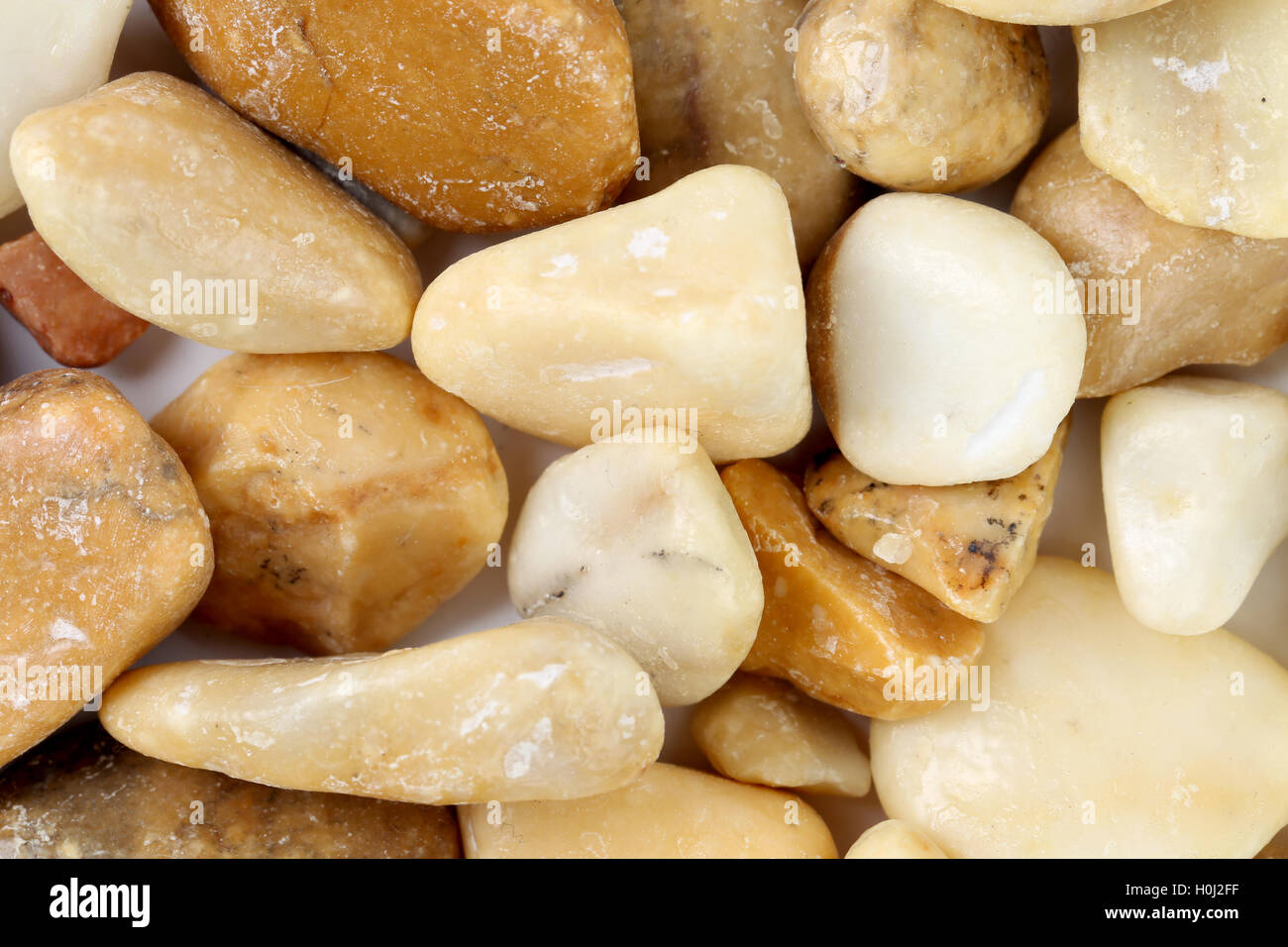 Pebbles as a stone texture Stock Photo - Alamy