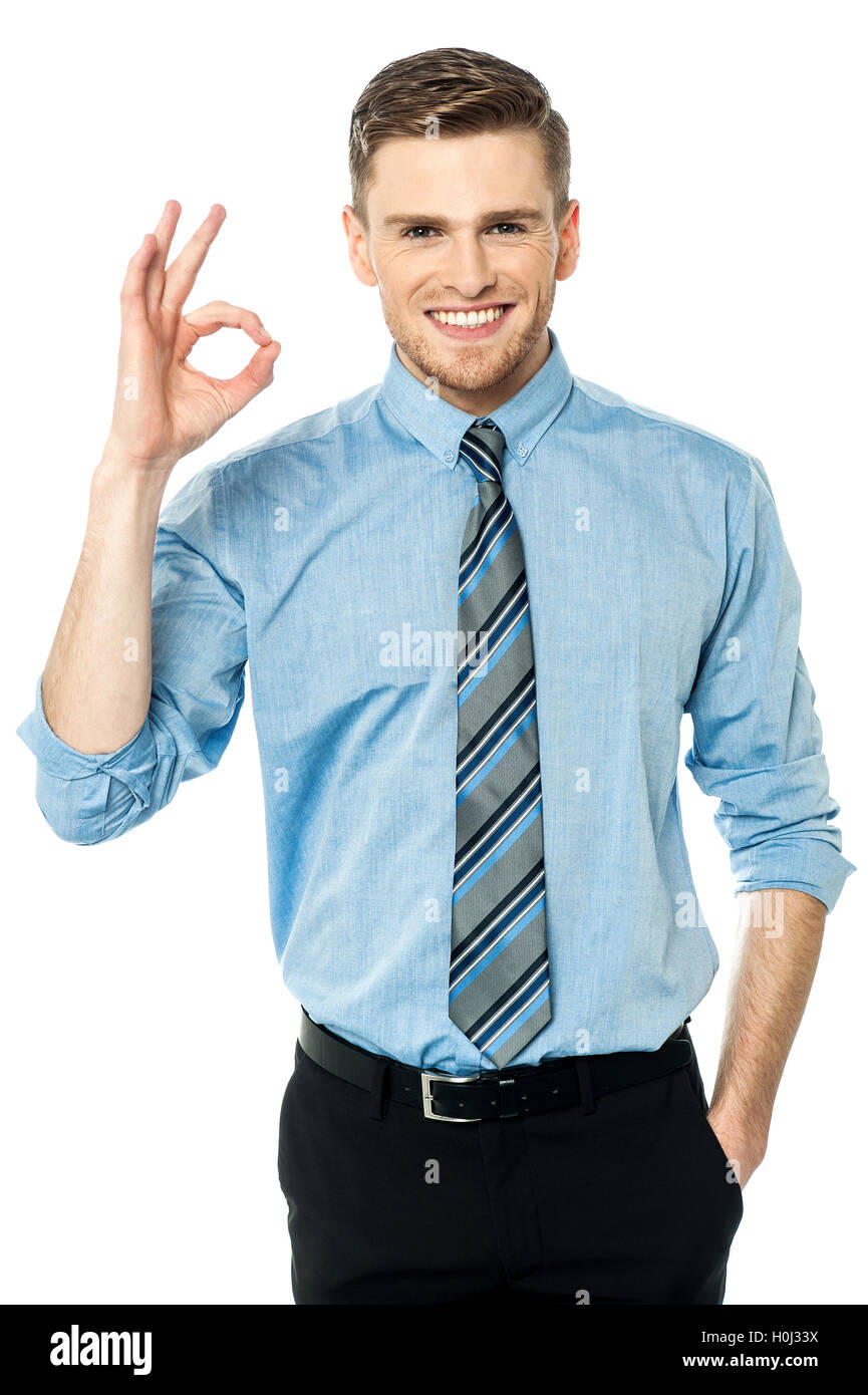 Executive gesturing perfect sign Stock Photo - Alamy