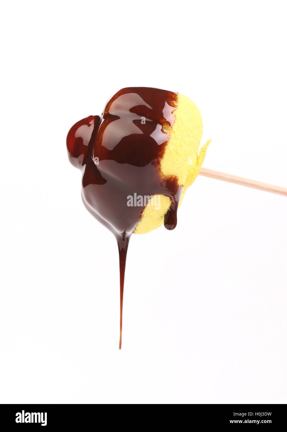 Marshmallow with chocolate dripping Stock Photo - Alamy