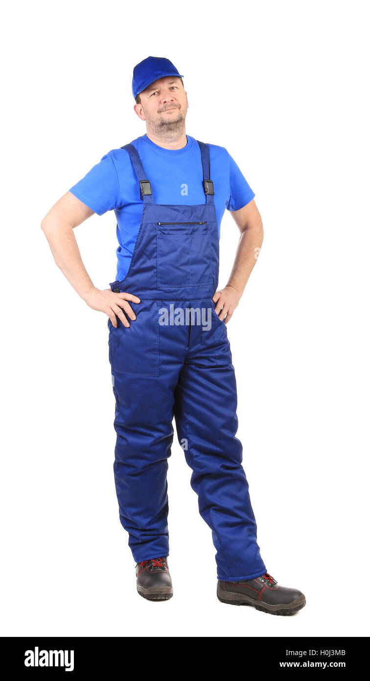 Worker in blue overalls Stock Photo - Alamy