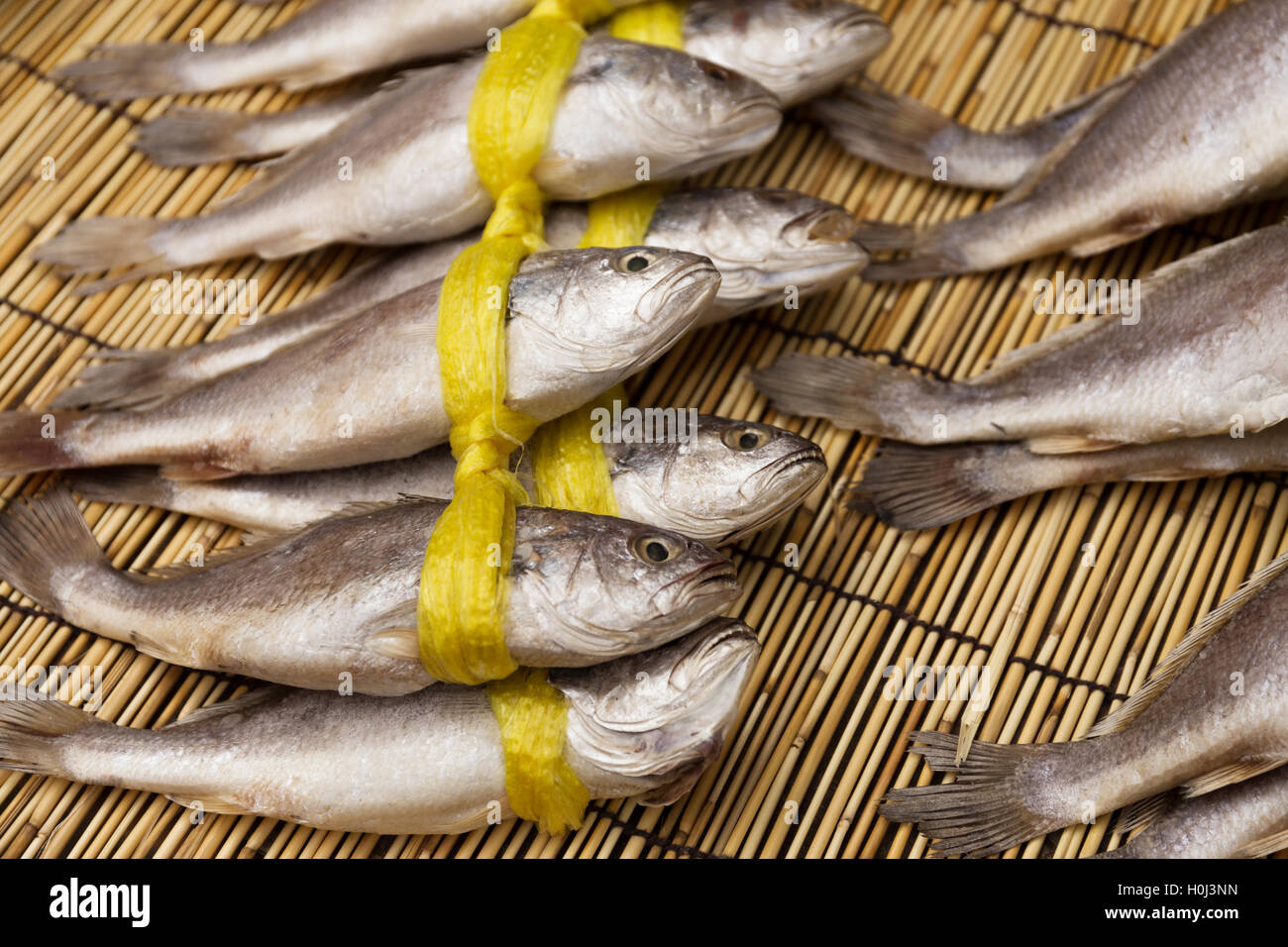 Dry salty fish Stock Photo - Alamy