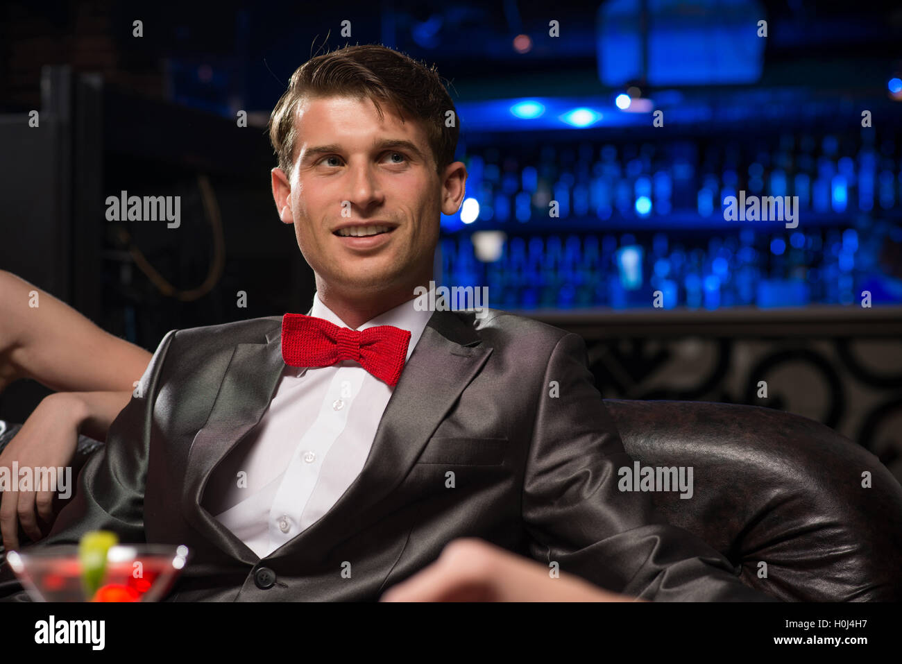portrait of a man in a nightclub Stock Photo - Alamy