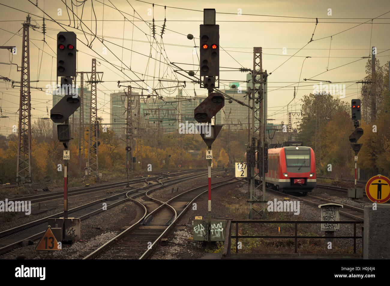 Mobile photography tone red train on railway track Stock Photo - Alamy