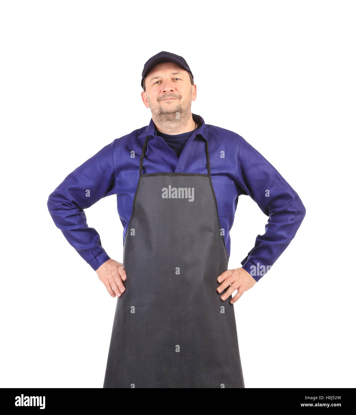 Worker wearing black apron Stock Photo - Alamy