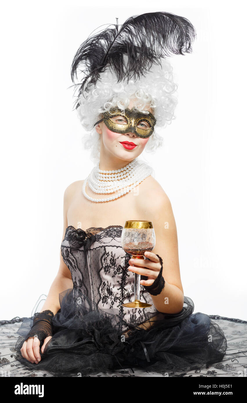Masquerade in Venice. Princess in a black dress with a glass of Stock ...