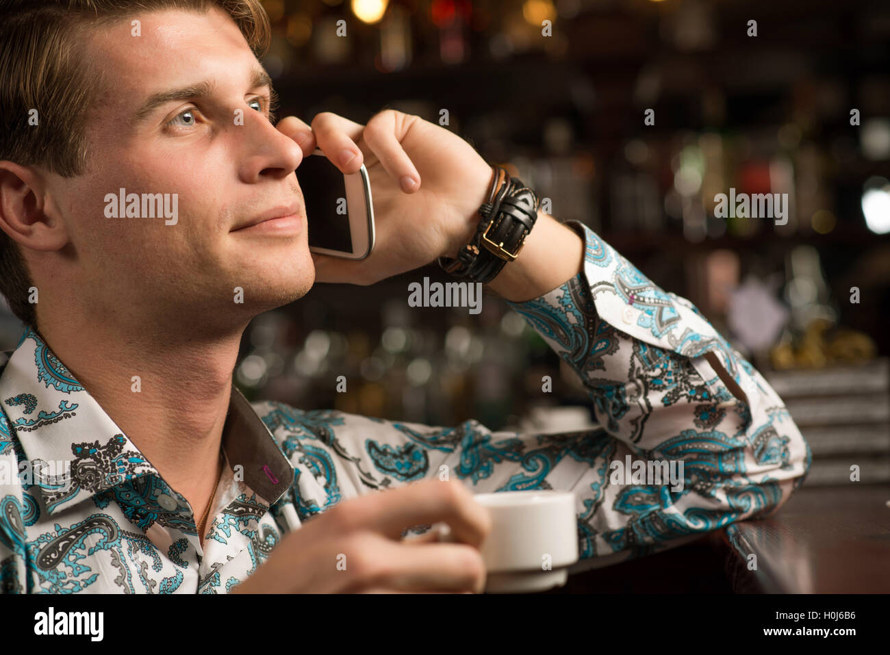 young man at the bar Stock Photo - Alamy