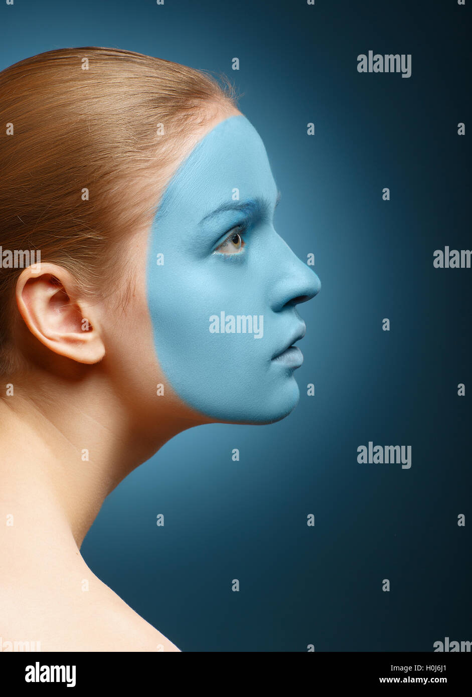 Young girl with facial mask Stock Photo - Alamy