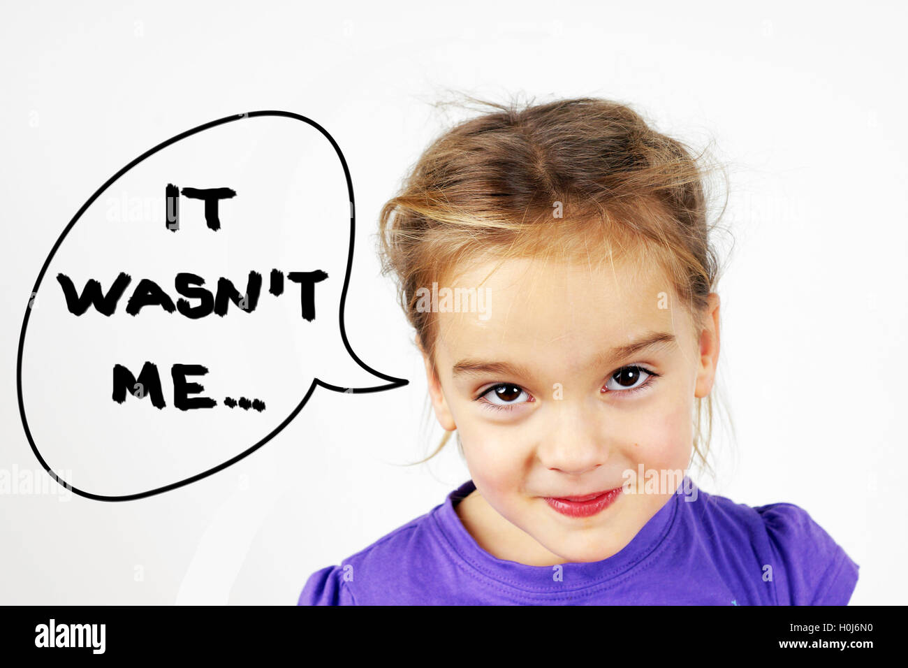 Mischievous little girl with text Stock Photo - Alamy