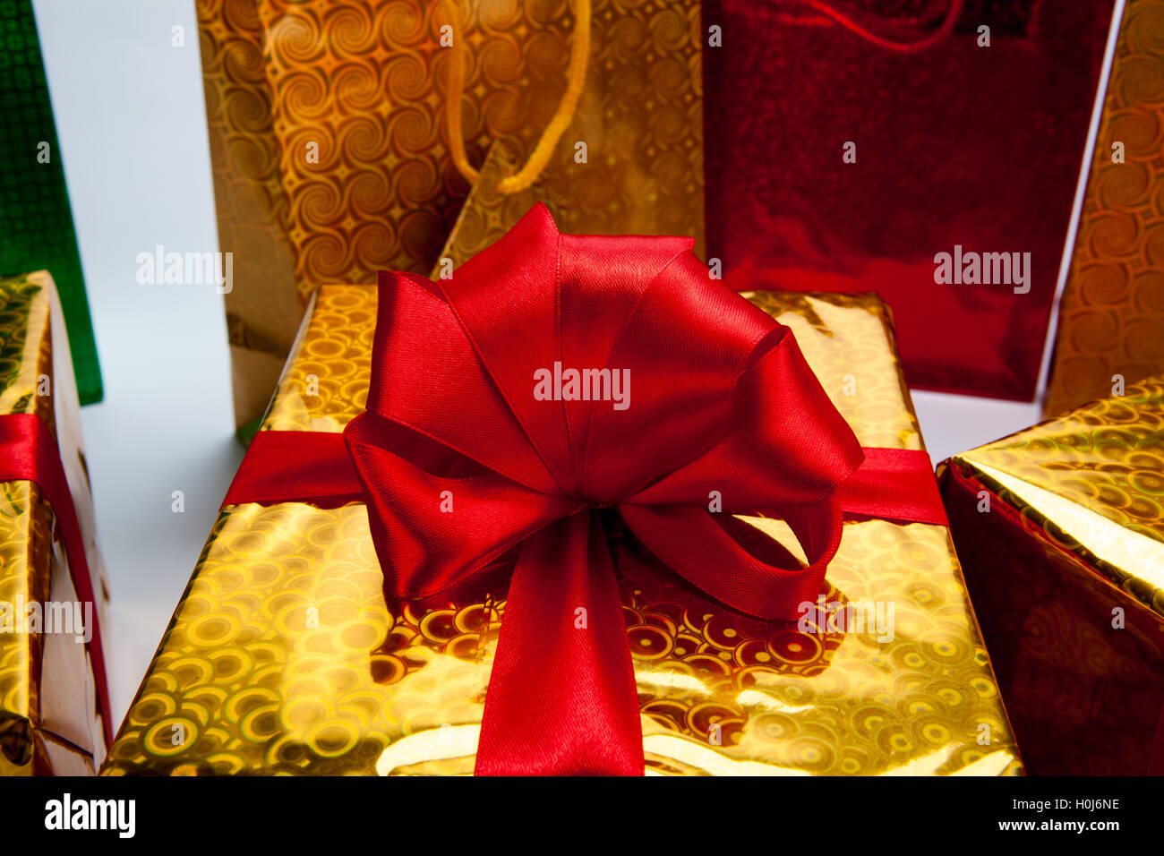 Gold gift boxes Stock Photo - Alamy