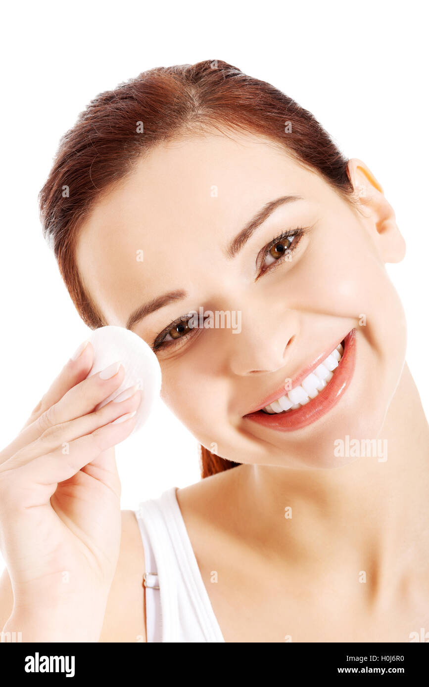 beautiful woman cleaning her face with cotton pads Stock Photo - Alamy