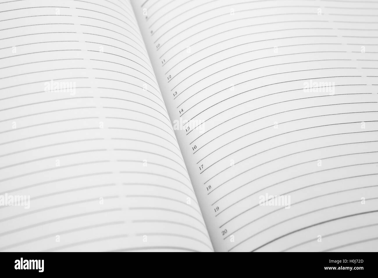 Open book with lines Stock Photo - Alamy