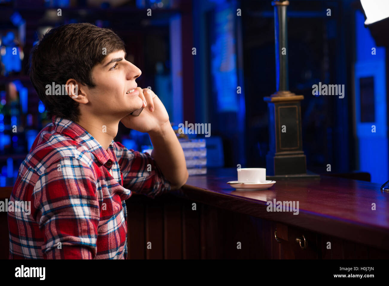 young man at the bar Stock Photo - Alamy