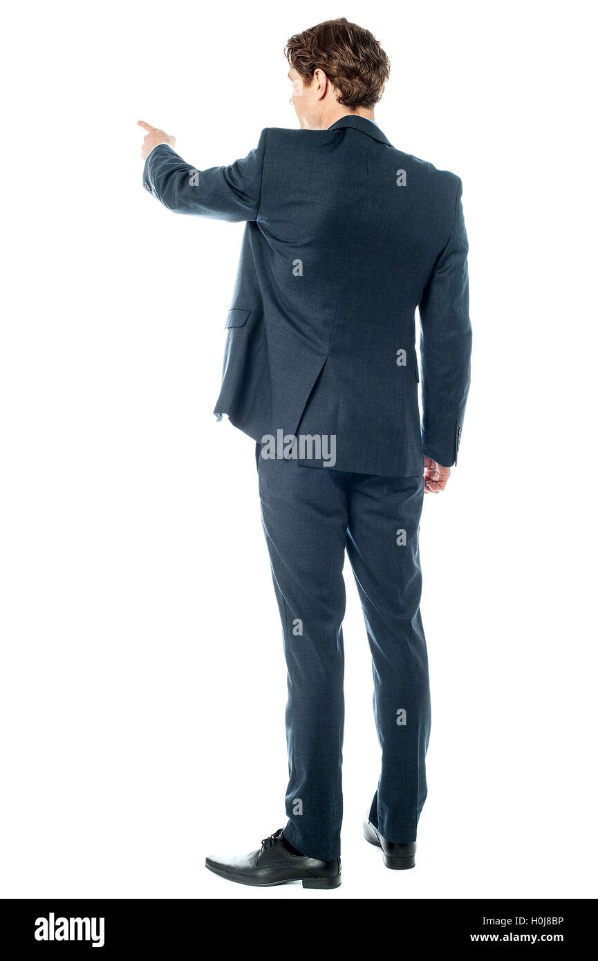 Businessman pointing at something Stock Photo - Alamy