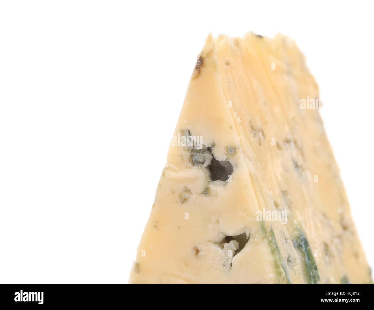 Slice of dor blue cheese Stock Photo - Alamy