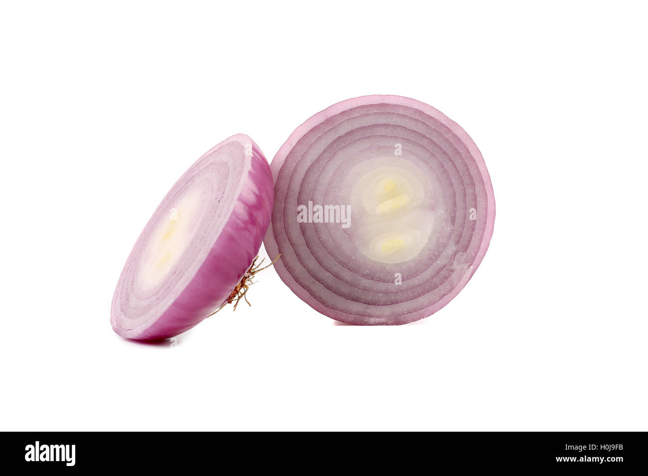 Cut in half red onion Stock Photo - Alamy