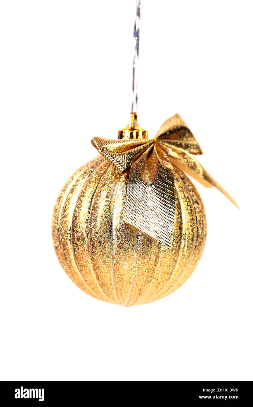 Golden christmas ball with ribbon Stock Photo - Alamy