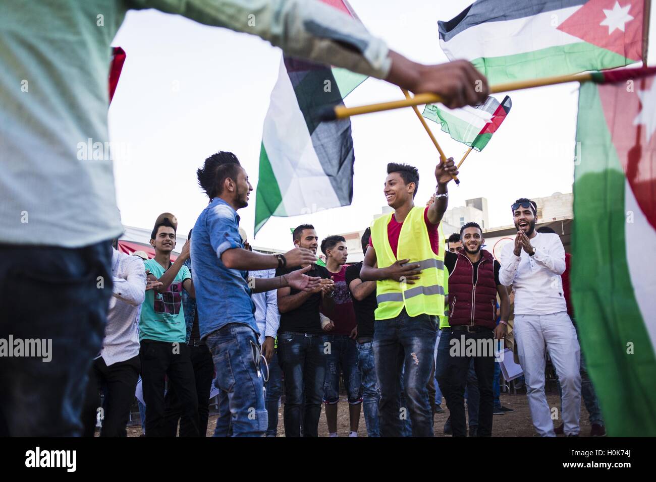 Amman, Amman, Jordan. 10th Sep, 2016. Young Jordanians dance and wave ...