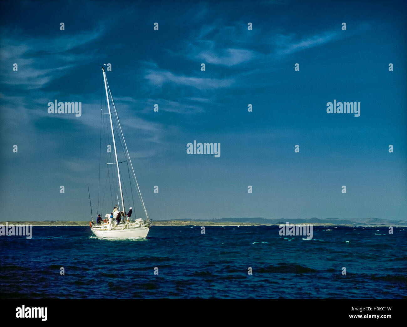 Yacht sailing on the open ocean Stock Photo - Alamy