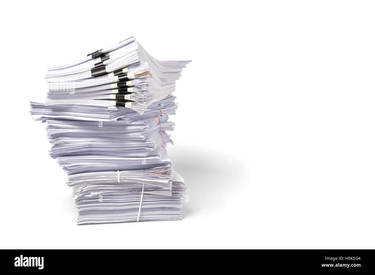 Stack of business papers isolated on white background. Copy space Stock ...