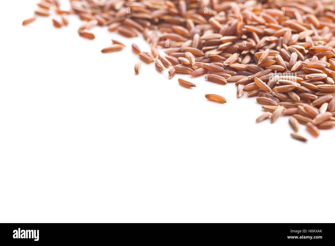 The red rice isolated on white background Stock Photo - Alamy