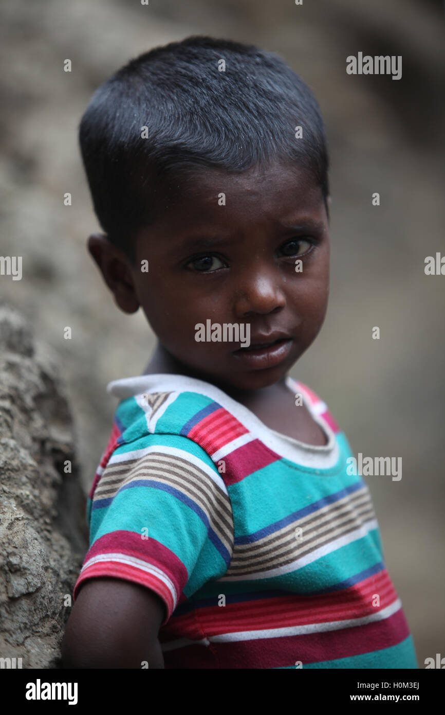 A portrait of a poor little boy from India in his unfortunate condition ...