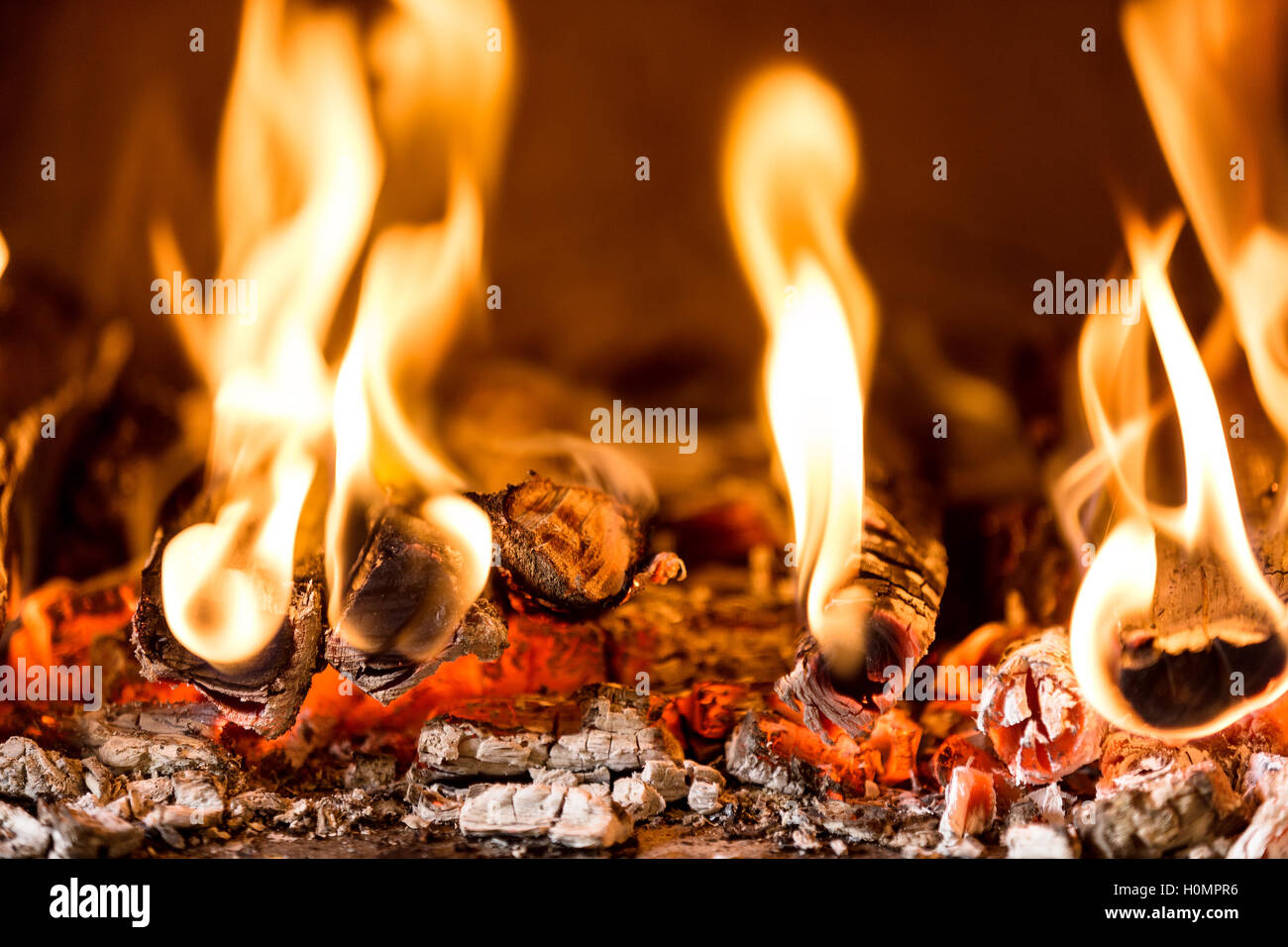 closeup of Flame in a fireplace, flames and burning woods Stock Photo ...
