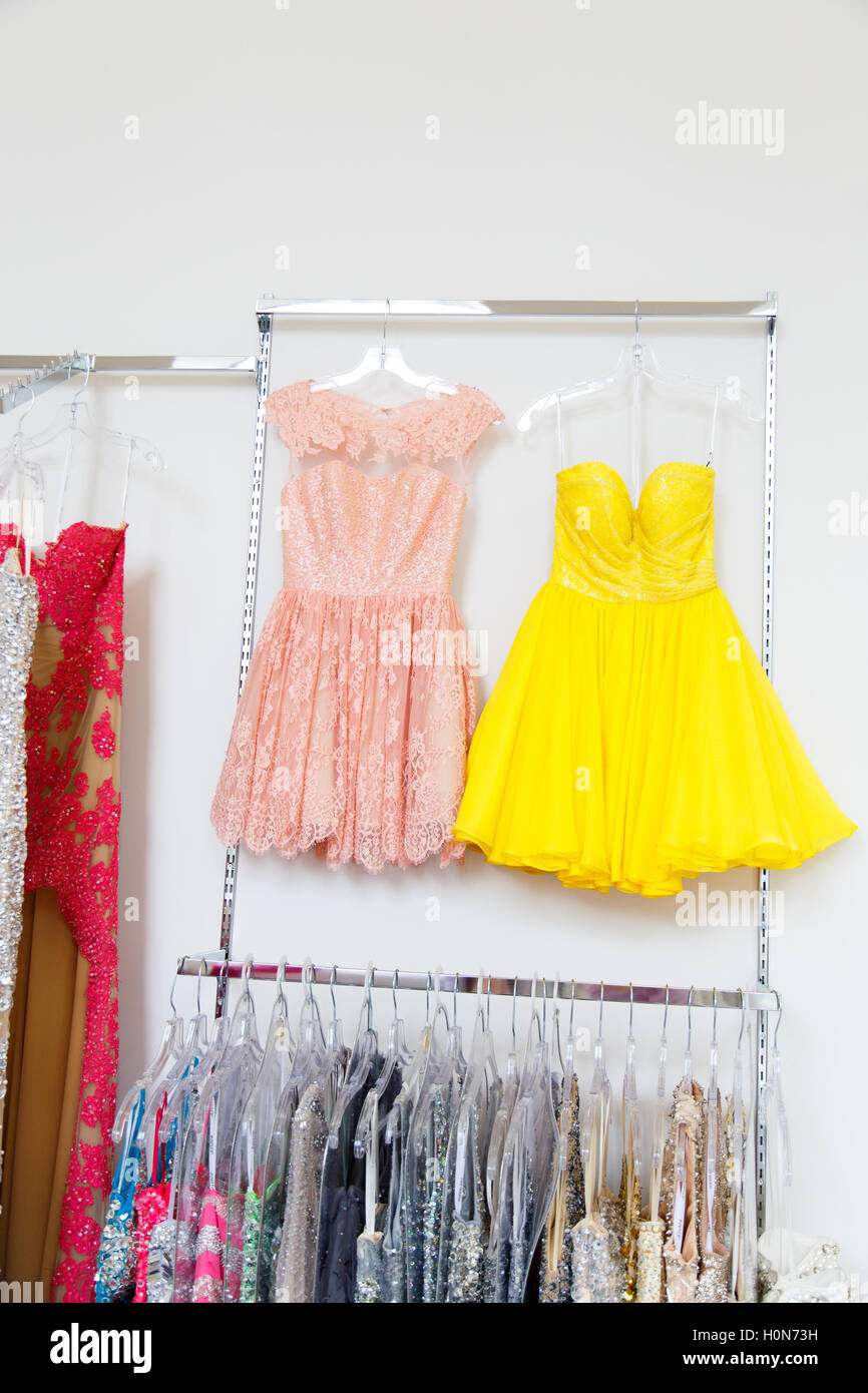 Evening dresses on hangers hi-res stock photography and images - Alamy