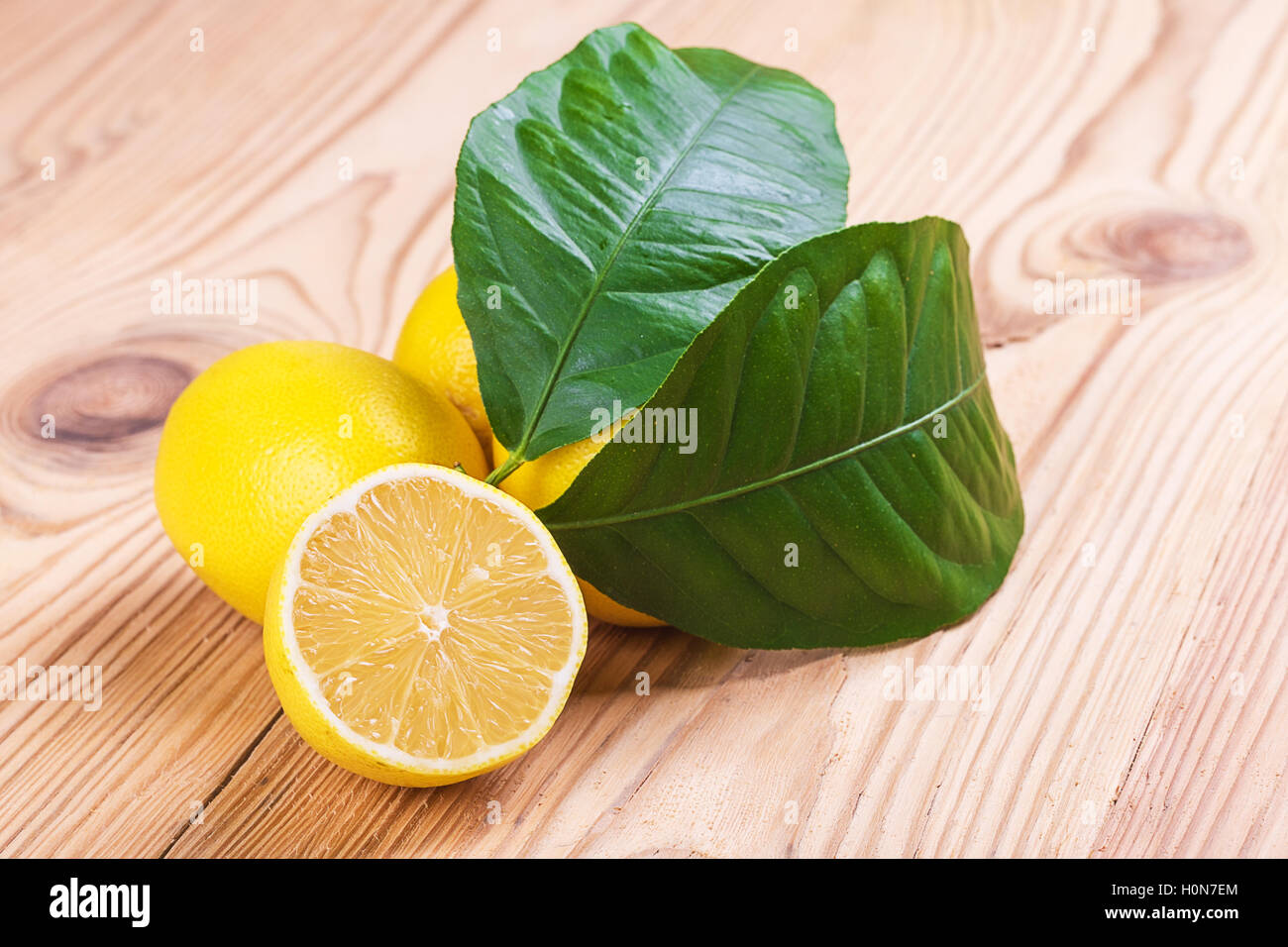 Lemon fruit with leave isolated on white background Stock Photo - Alamy