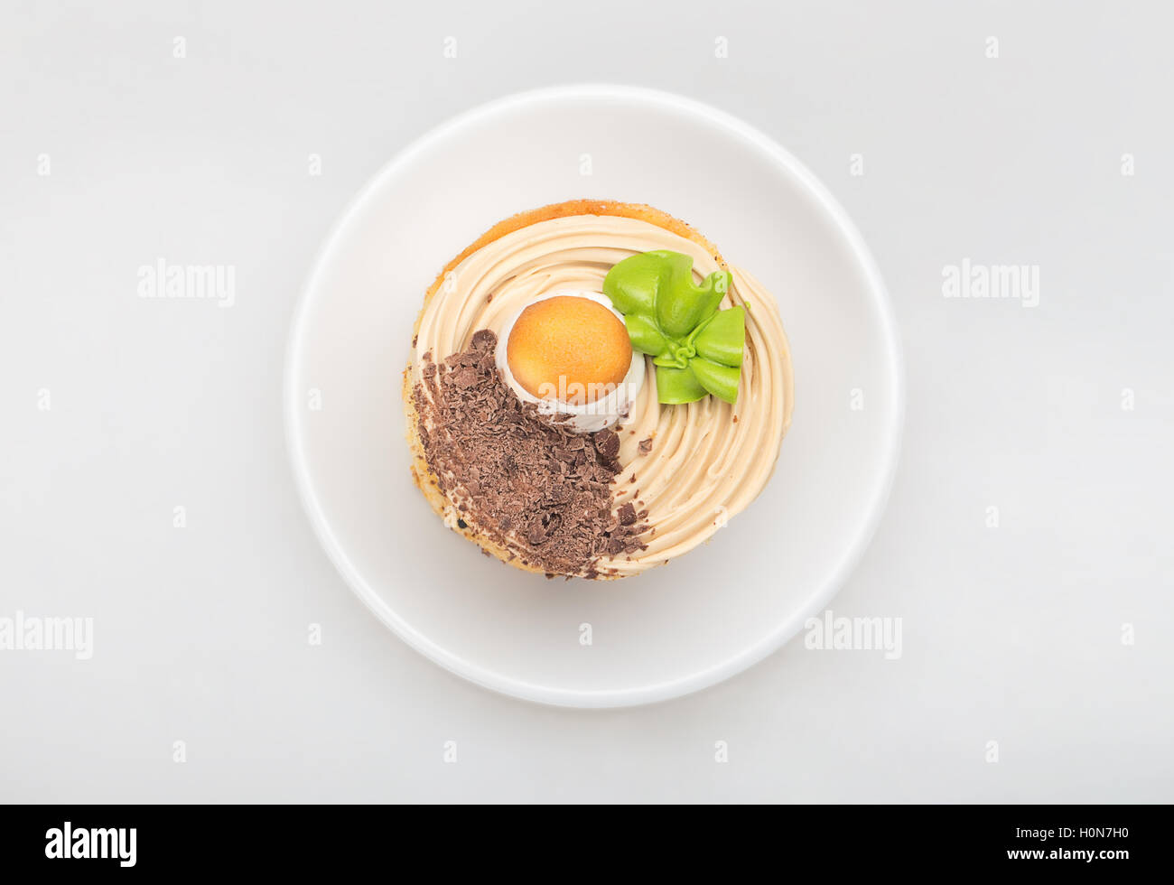 cake on a saucer view from above on white background Stock Photo - Alamy