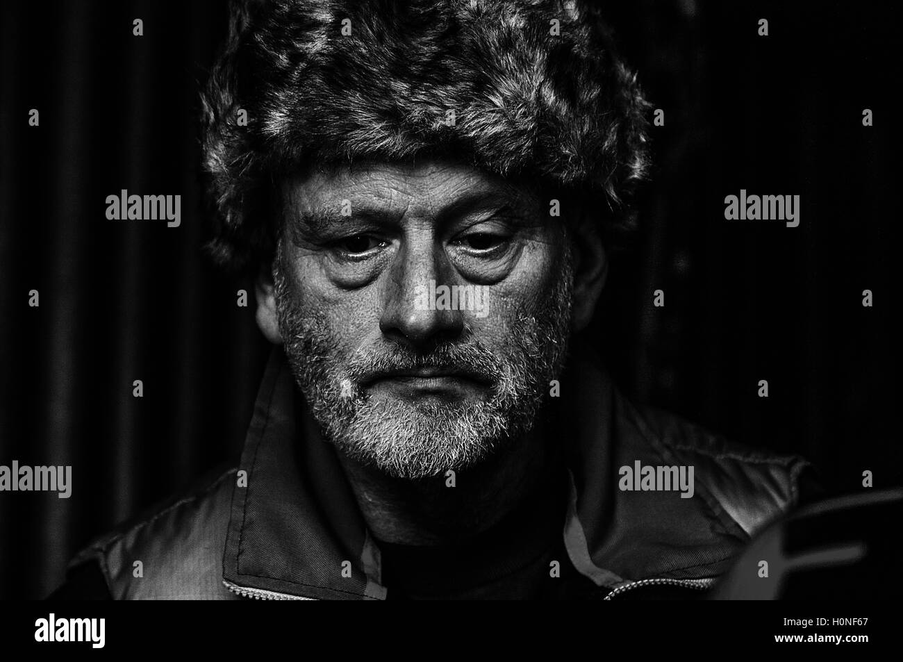 His face is a topographical map of intrigue... Deep concentration pours ...