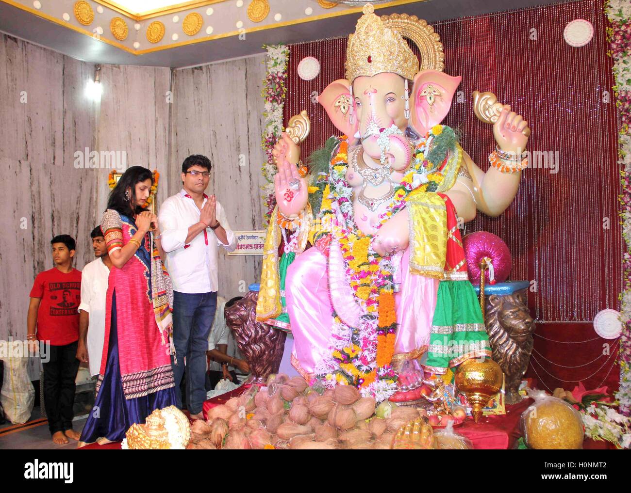 Fashion designer Riyaz Ganji and his wife Reshma offer prayer at the ...