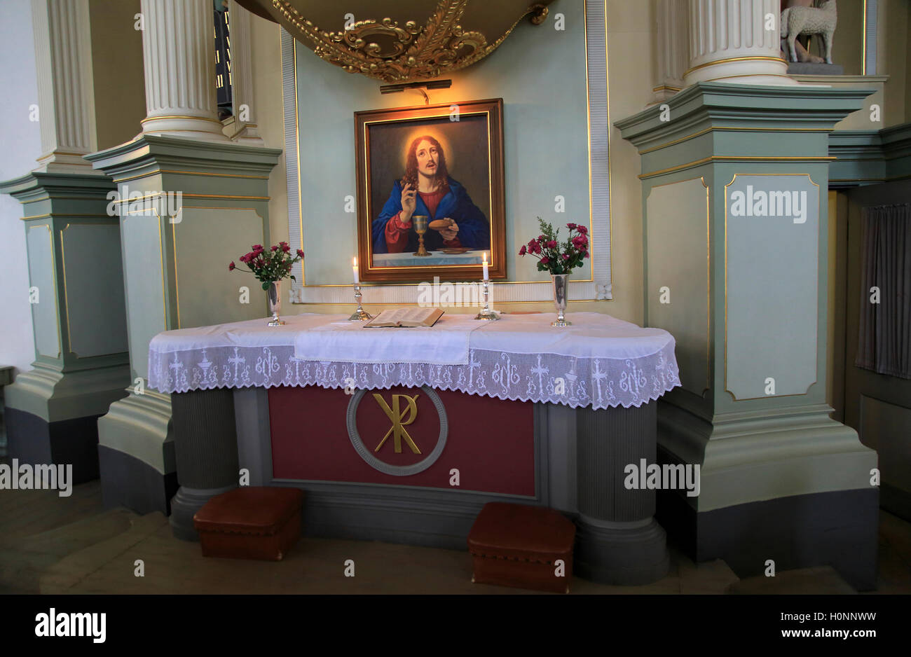 Jesus christ painting at altar inside historic nykirken church hi-res ...