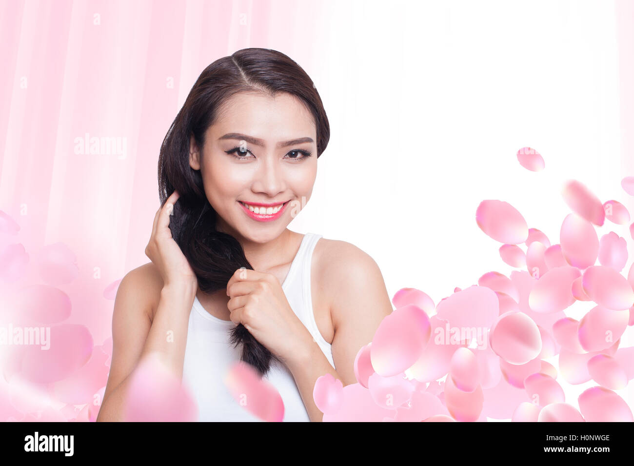Attractive asian woman skin care image Stock Photo - Alamy