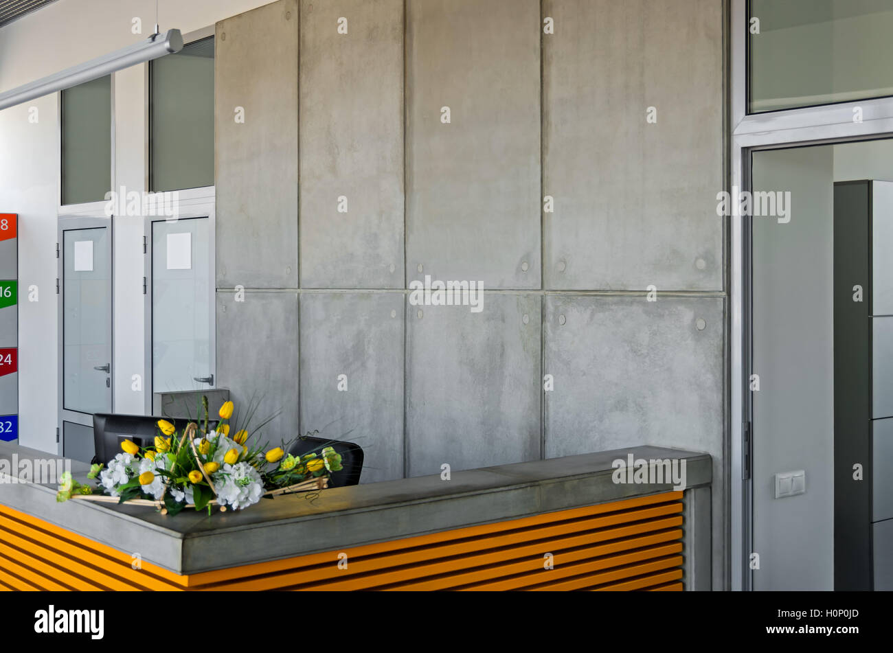 Gray-yellow modern counter on an internal entrance to metallurgical ...