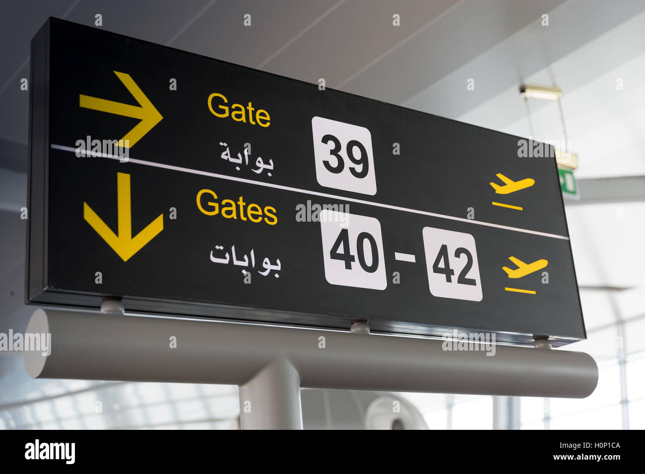 Black Airport Pointers - Gate direction Stock Photo - Alamy