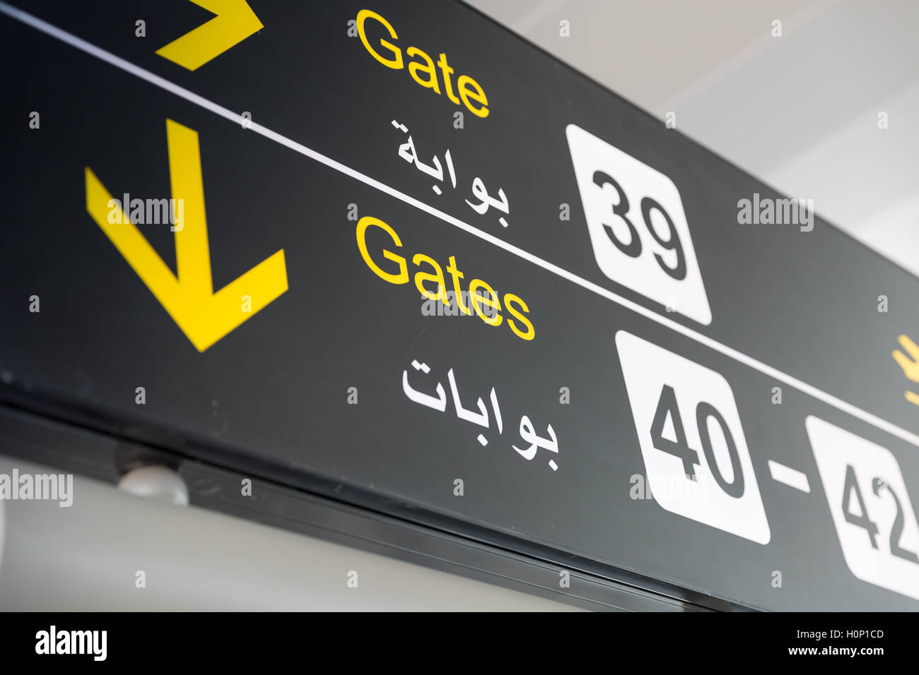 Black Airport Pointers - Gate direction Stock Photo - Alamy