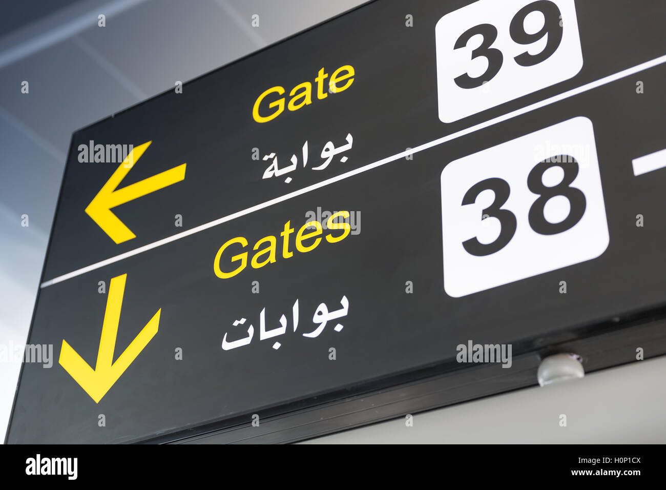 Black Airport Pointers - Gate direction Stock Photo - Alamy