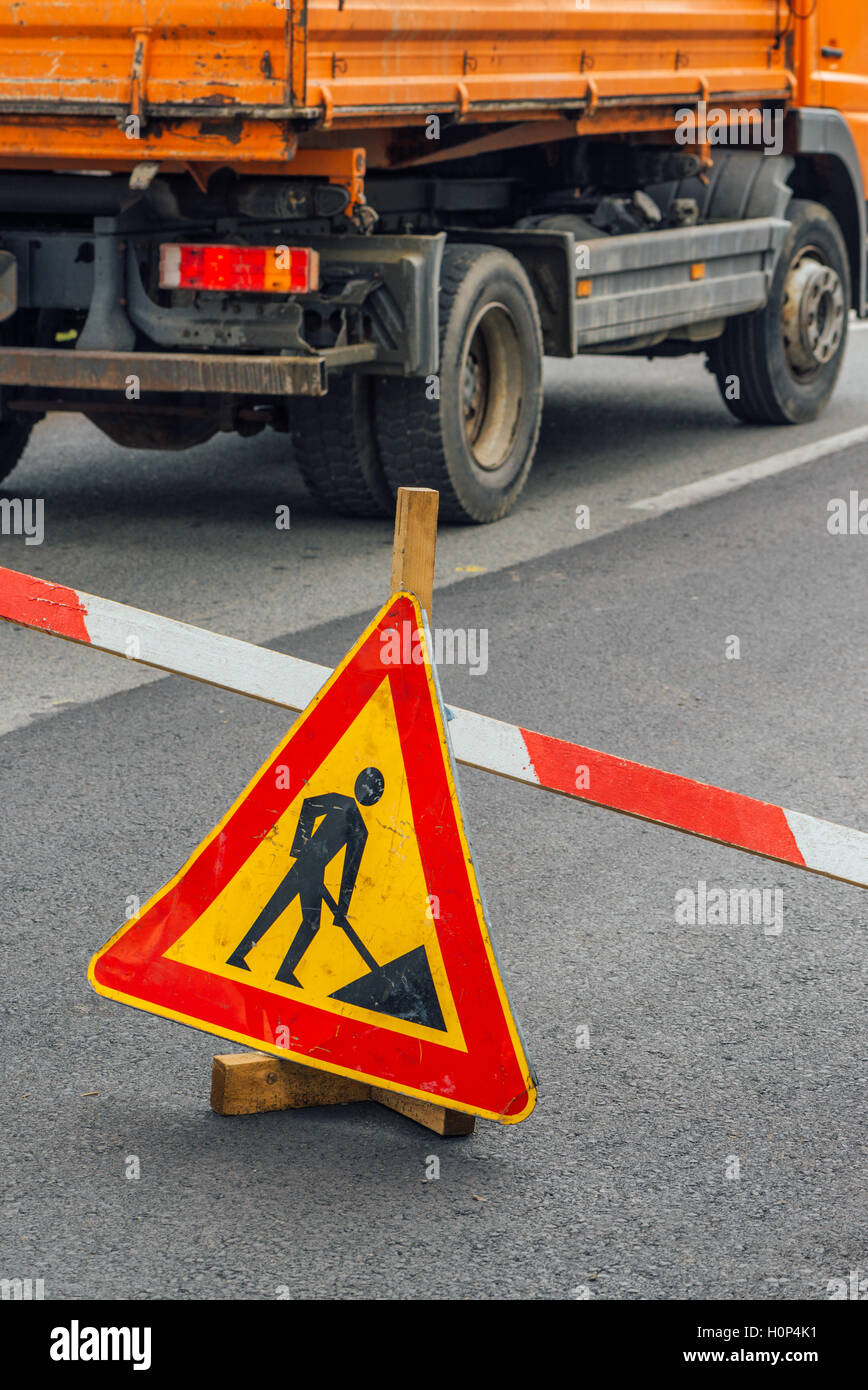Road construction work sign on asphalt driveway Stock Photo - Alamy